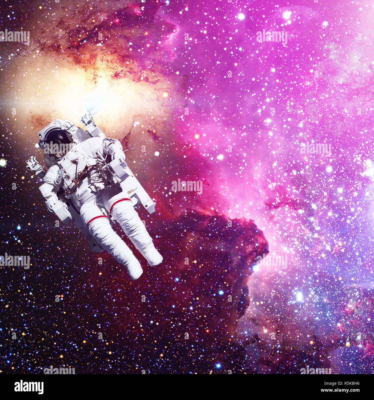 Astronaut in outer space. Nebula and stars on the background Stock ...