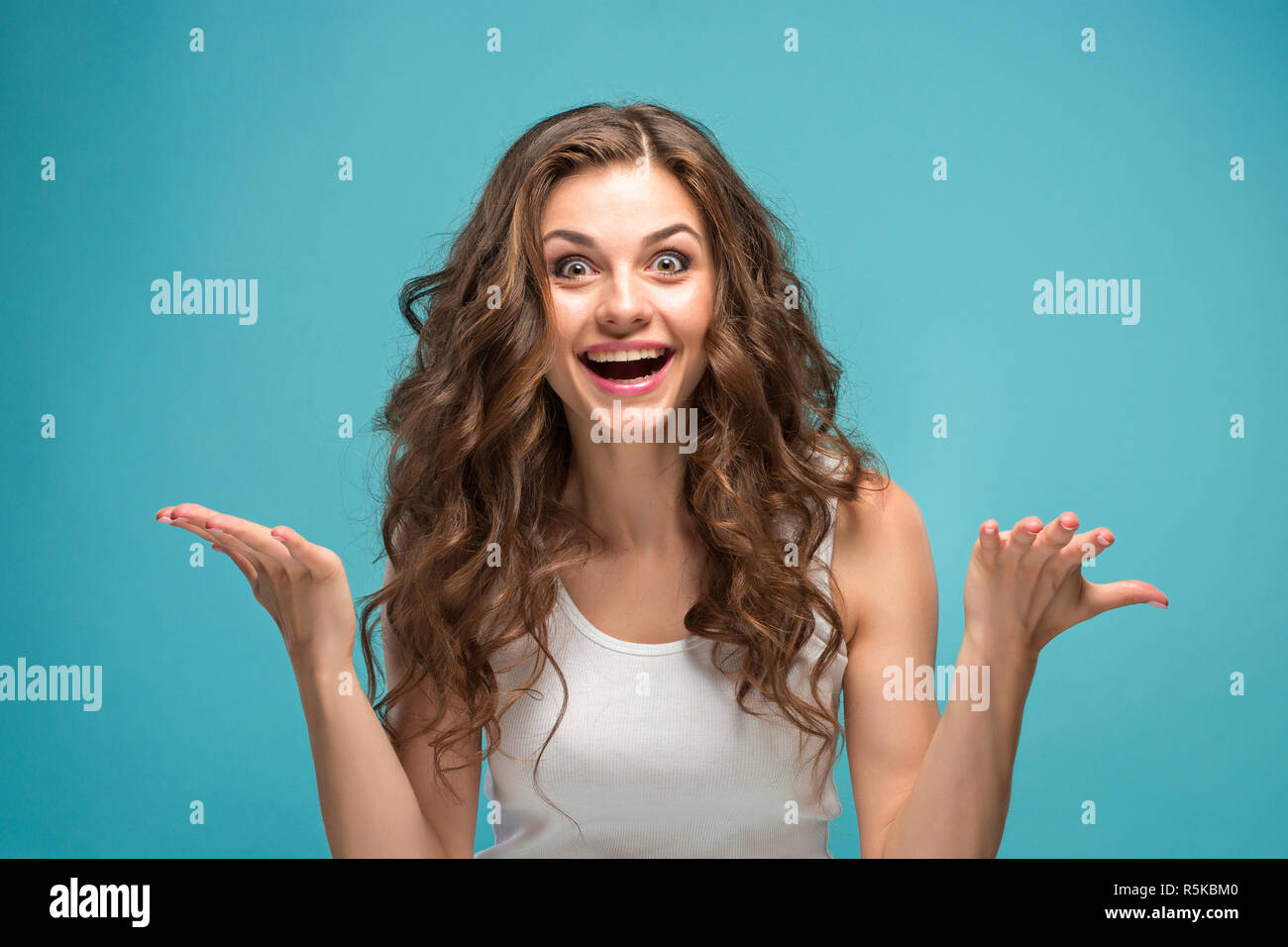The young woman's portrait with happy emotions Stock Photo - Alamy