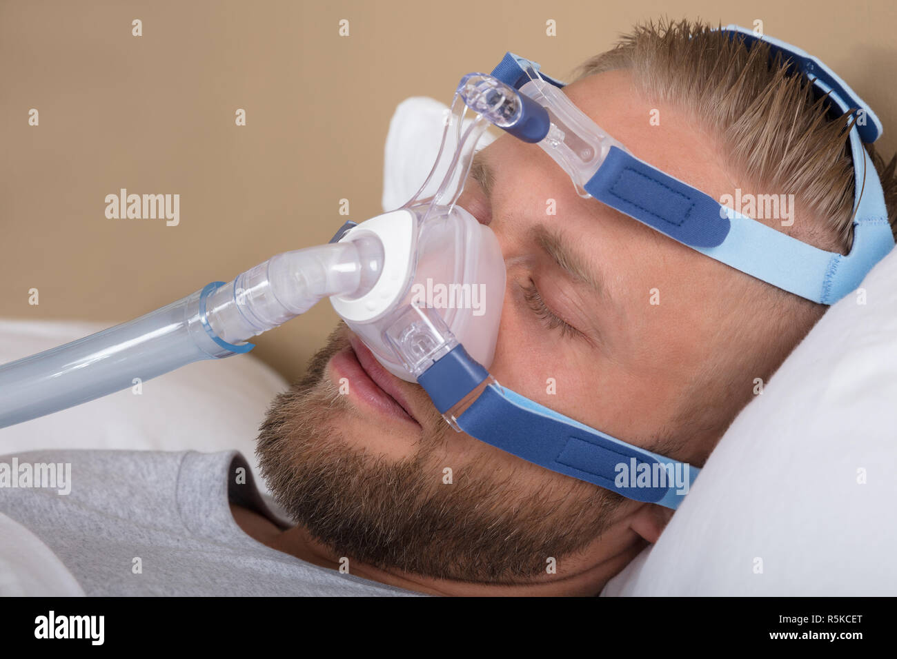 Man With Sleeping Apnea And CPAP Machine Stock Photo - Alamy Man With Sleeping Apnea And CPAP Machine Stock Photo - Alamy