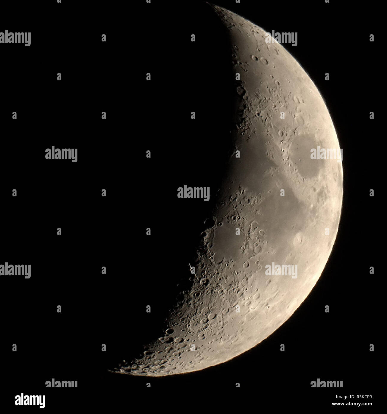 Waxing crescent moon seen with telescope Stock Photo - Alamy