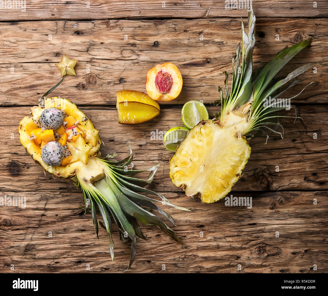 Pineapple stuffed with exotic fruits Stock Photo - Alamy