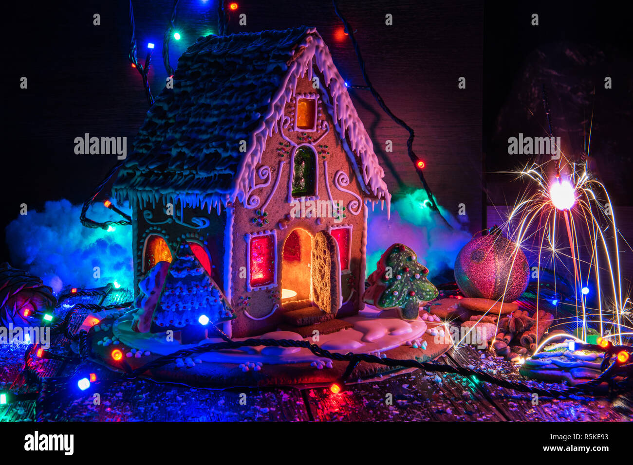 Gingerbread house with lights Stock Photo - Alamy