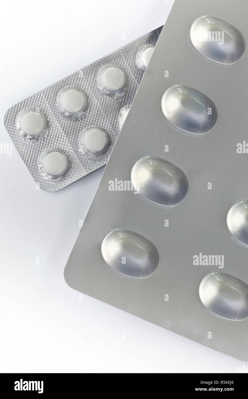 Medication pads on white background Stock Photo - Alamy