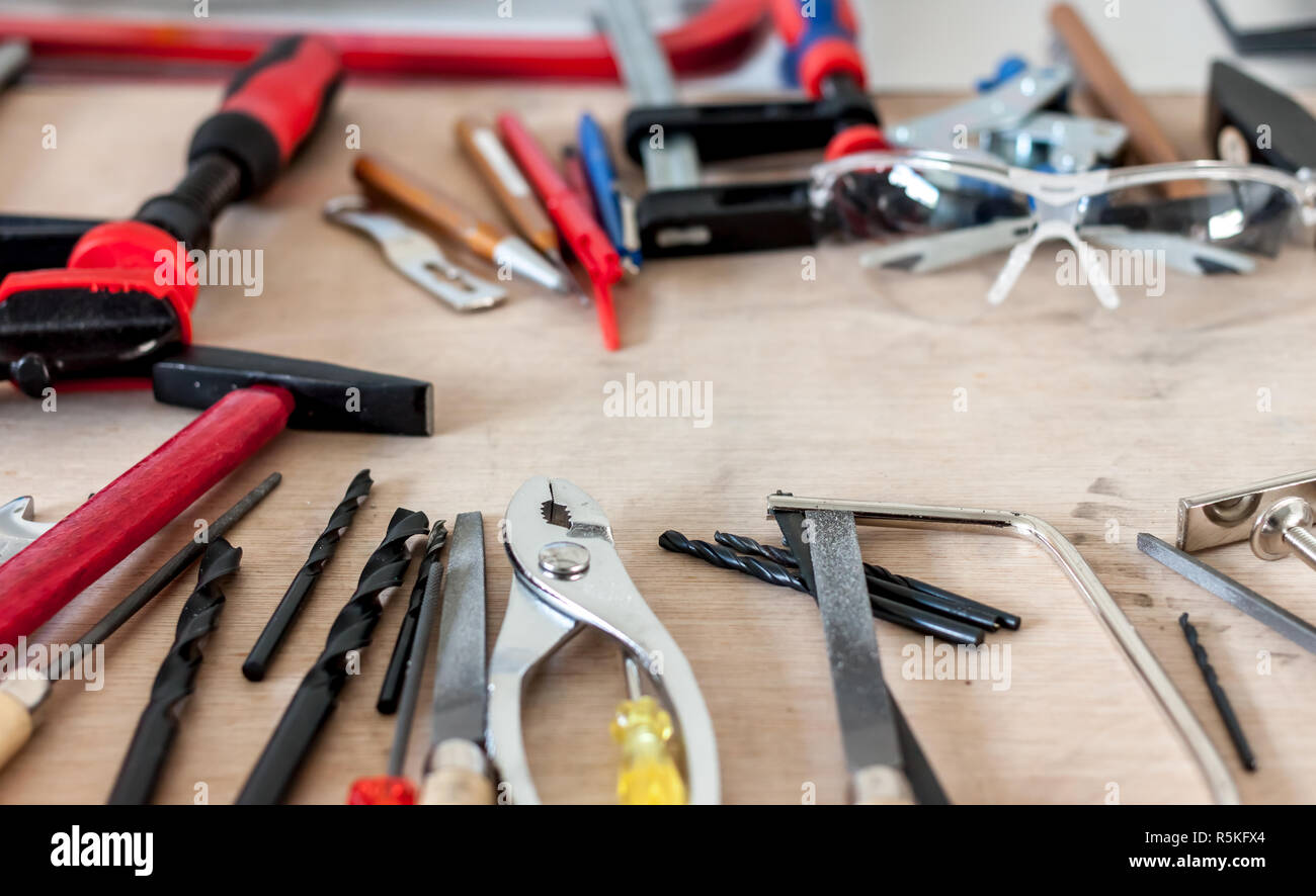 black and white many different tools in mess Stock Photo - Alamy