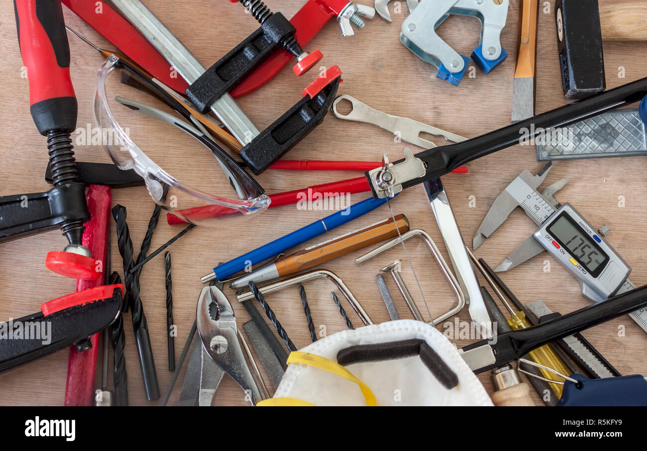many different tools in mess Stock Photo - Alamy