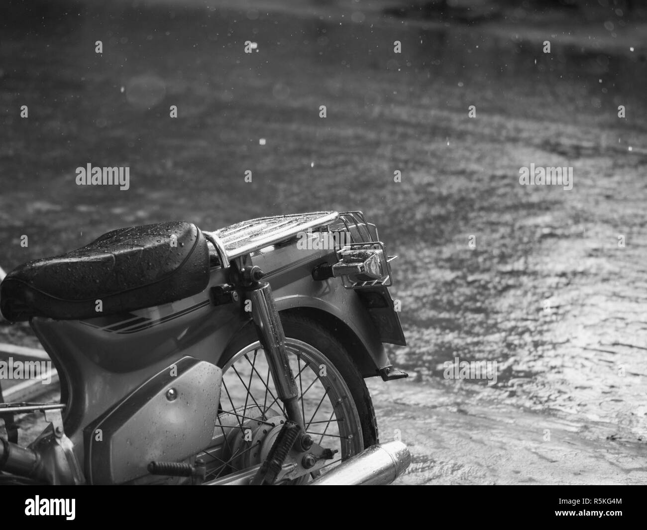 Motorcycle rain Black and White Stock Photos & Images - Alamy