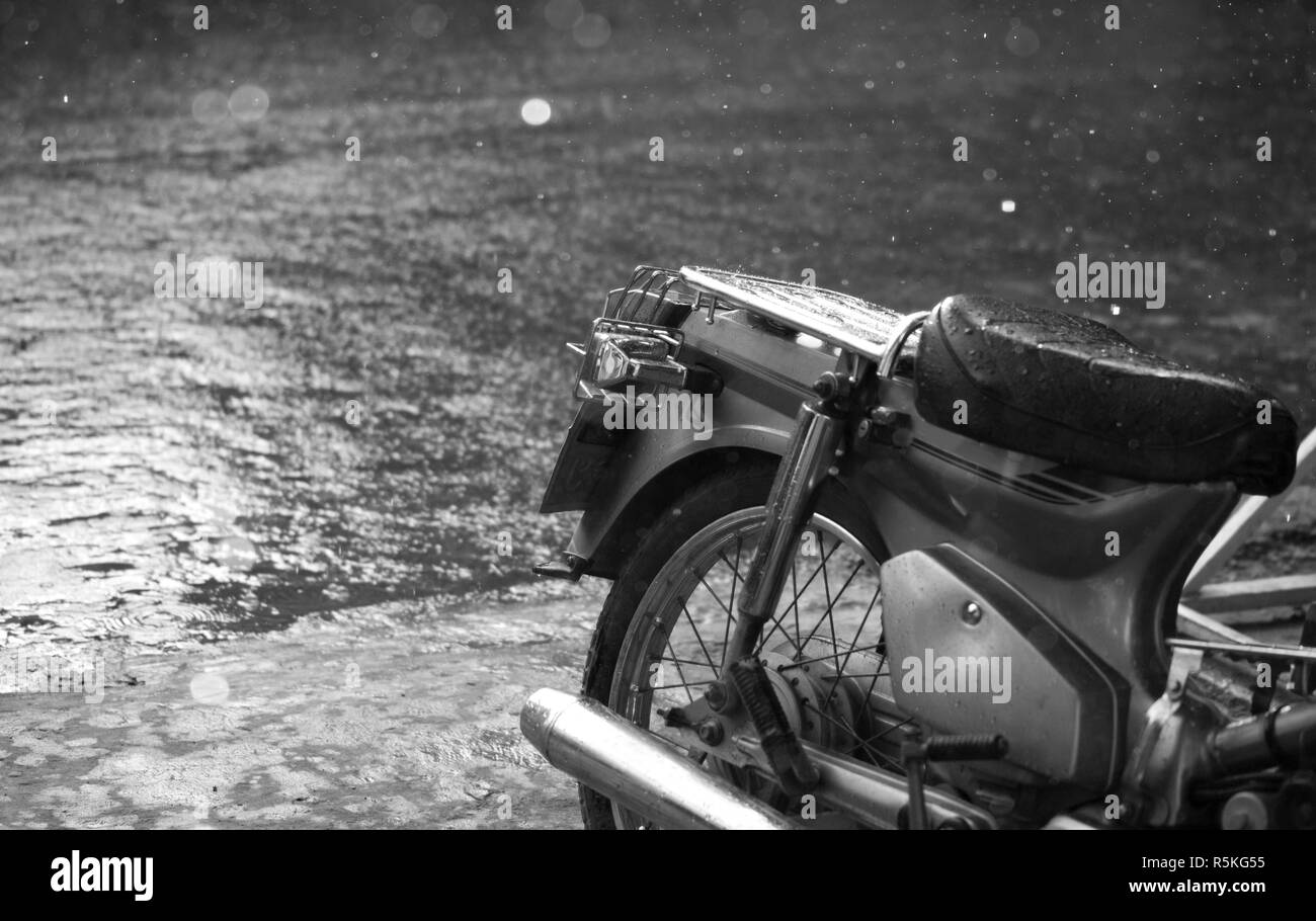 Motorcycle rain Black and White Stock Photos & Images - Alamy