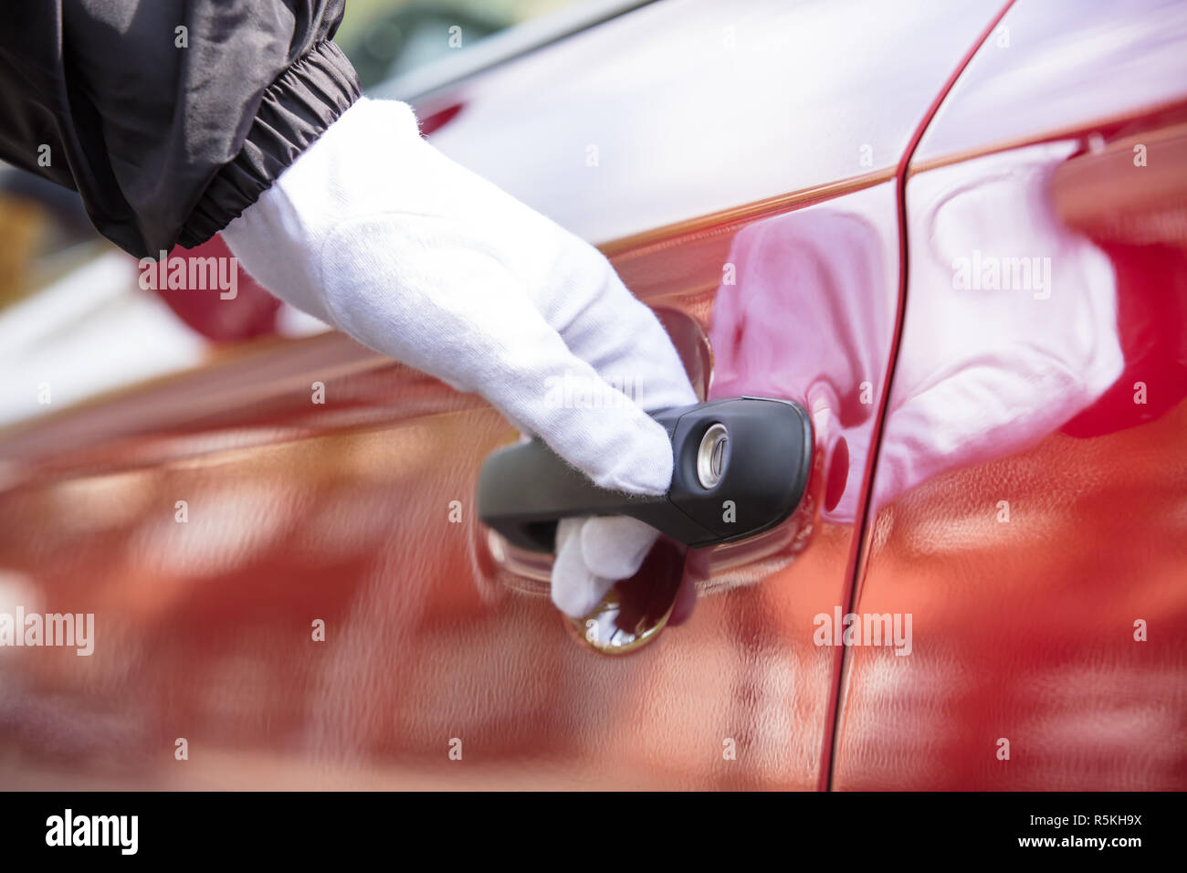 Valet Opening Car Door Stock Photo - Alamy