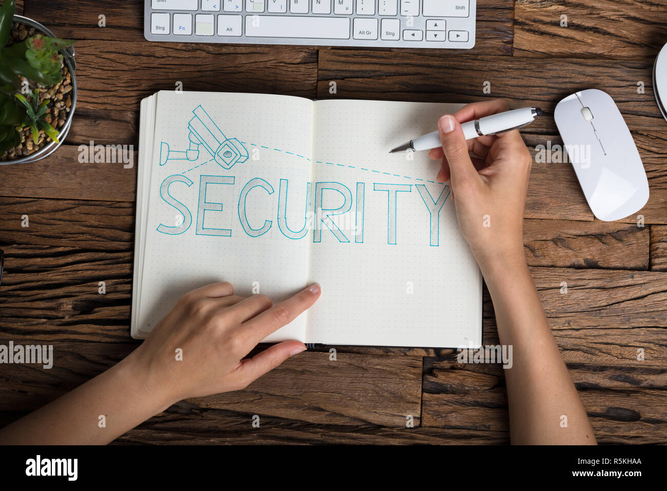 Female security guard at desk hi-res stock photography and images - Alamy