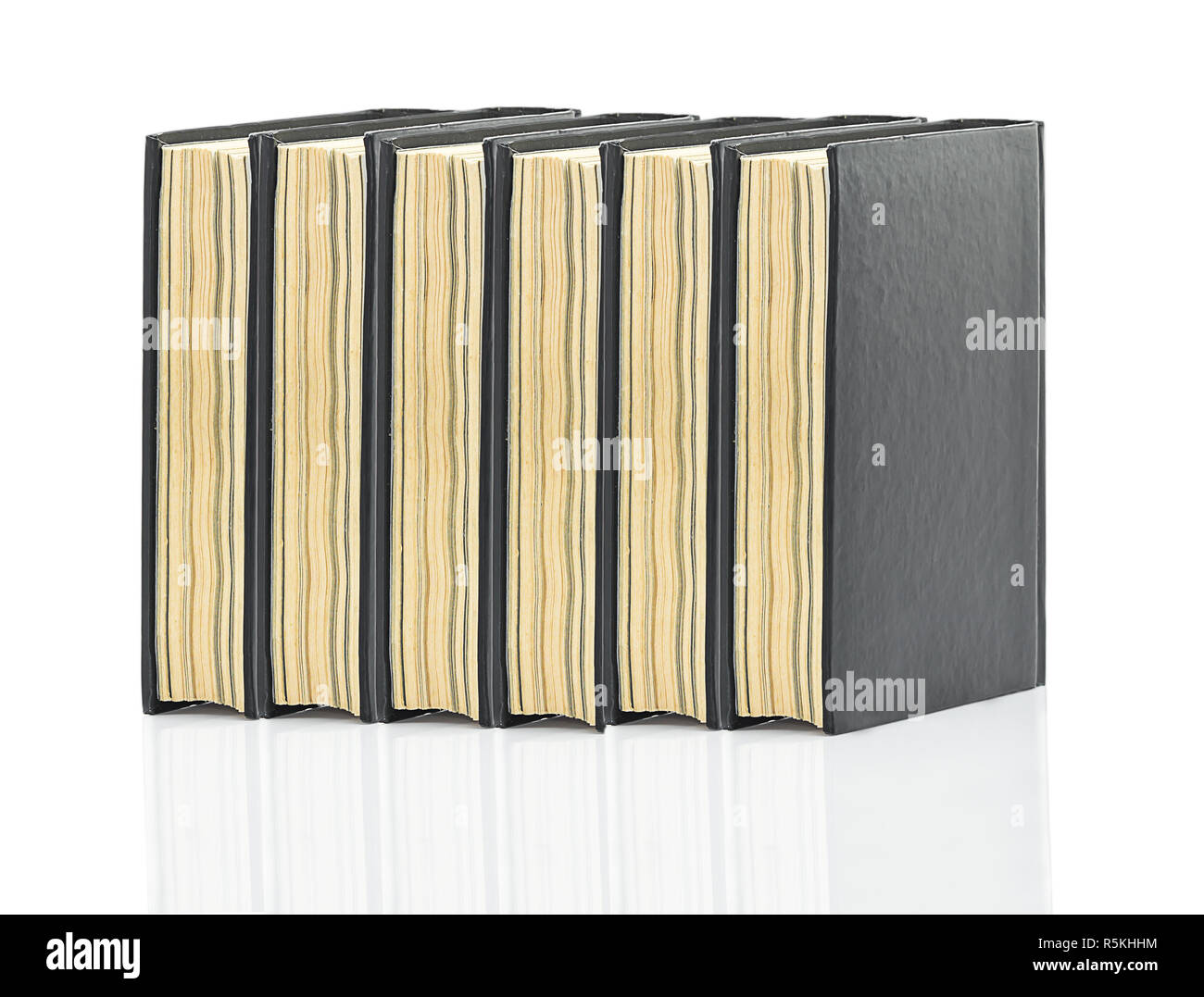Black hardcover book on white glossy background Stock Photo - Alamy
