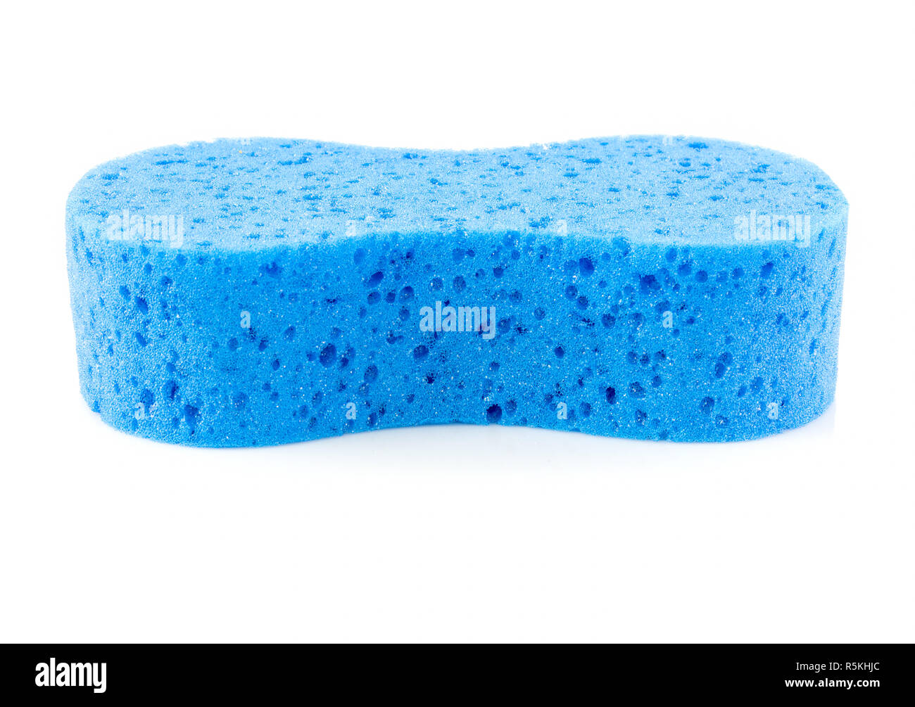 Blue sponge on white Stock Photo - Alamy