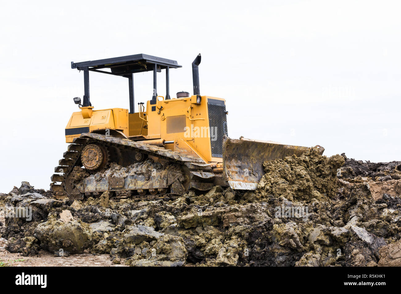 Bulldozer in construction site Stock Photo - Alamy