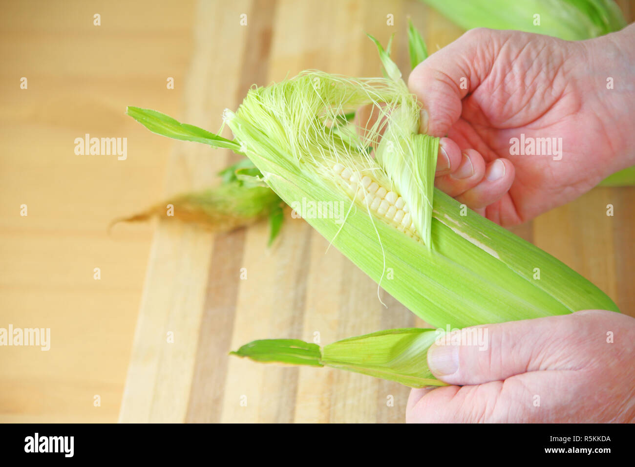 Corn shucks hi-res stock photography and images - Alamy