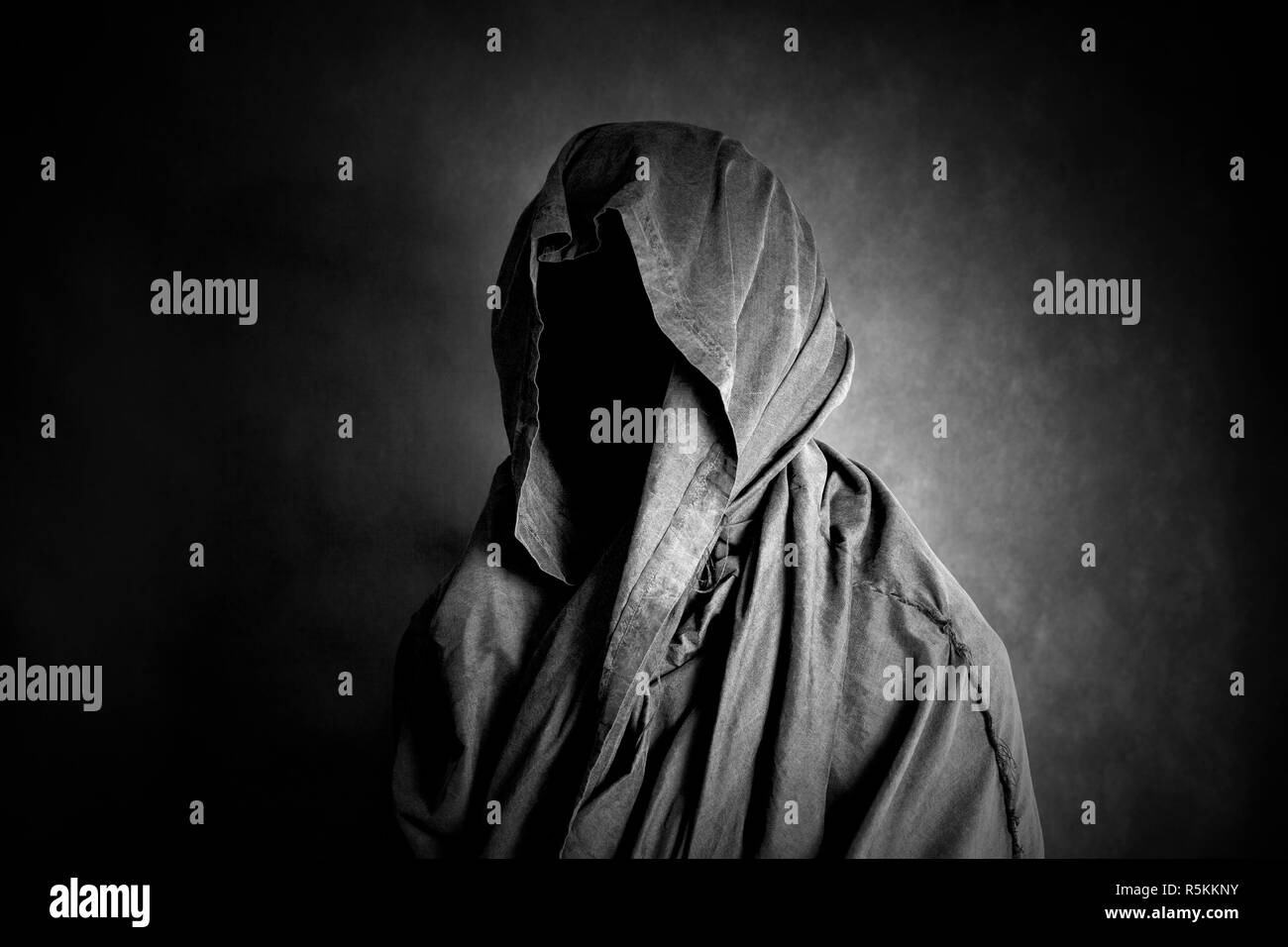 Ghostly figure in the dark Stock Photo - Alamy