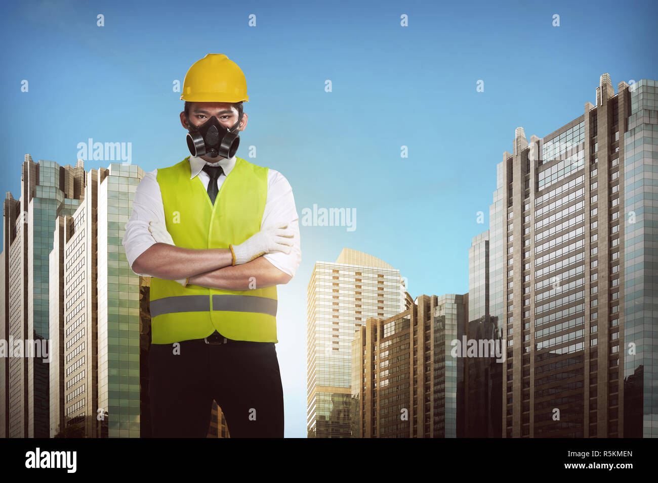 Asian engineer wearing safety vest Stock Photo - Alamy
