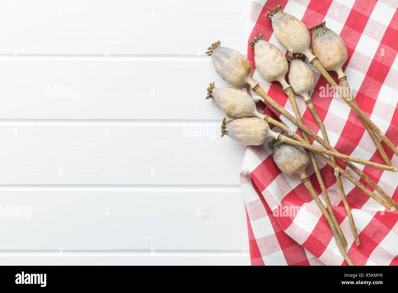 Dried poppy heads Stock Photo - Alamy