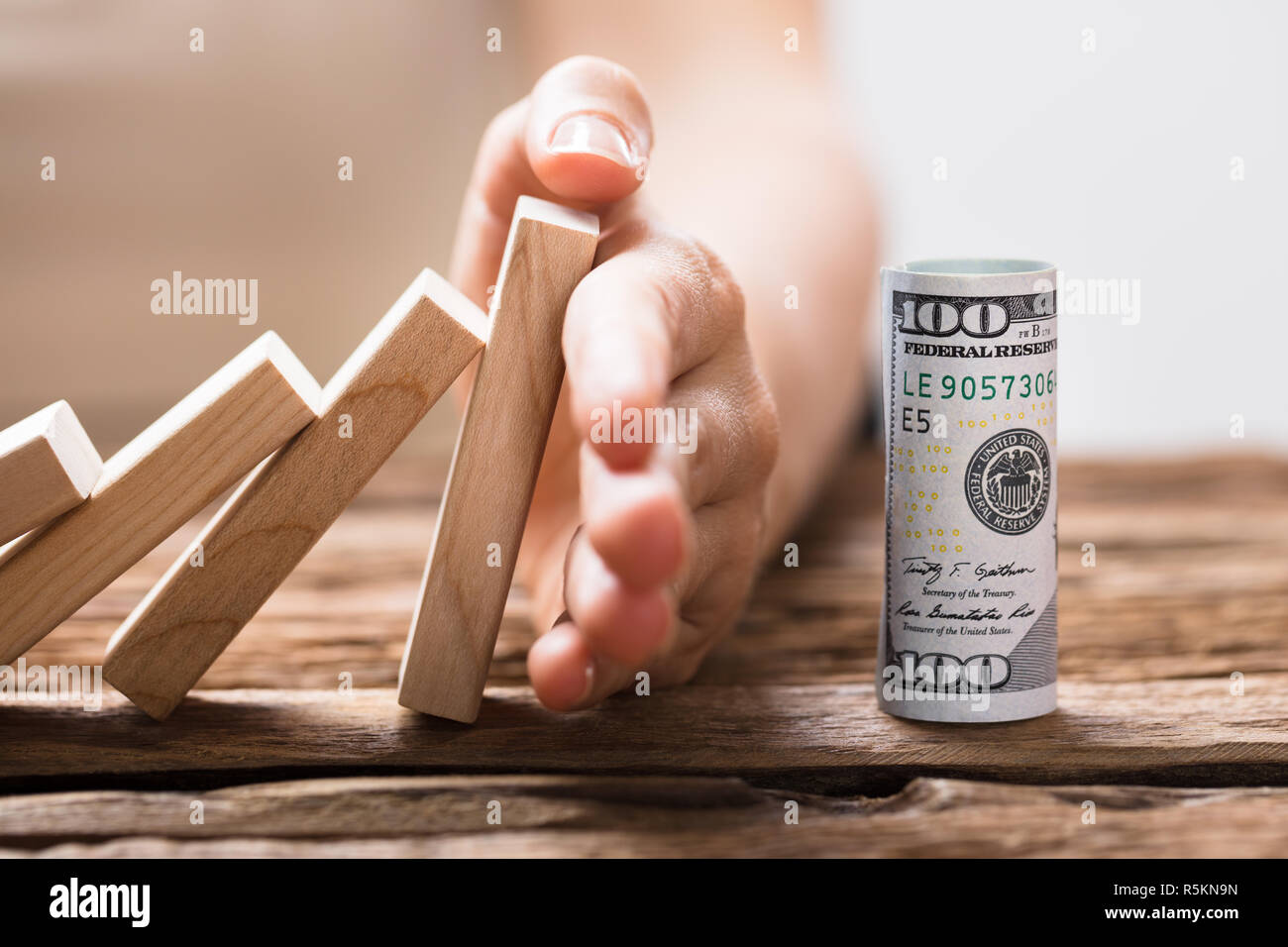 Person stops falling blocks on hi-res stock photography and images - Alamy