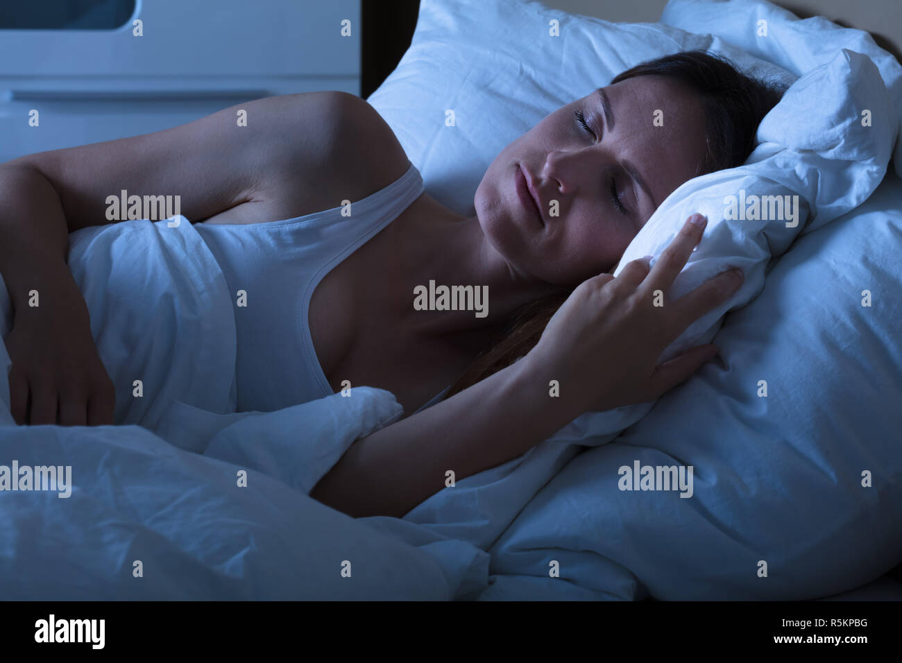 Woman Sleeping On Bed Stock Photo - Alamy