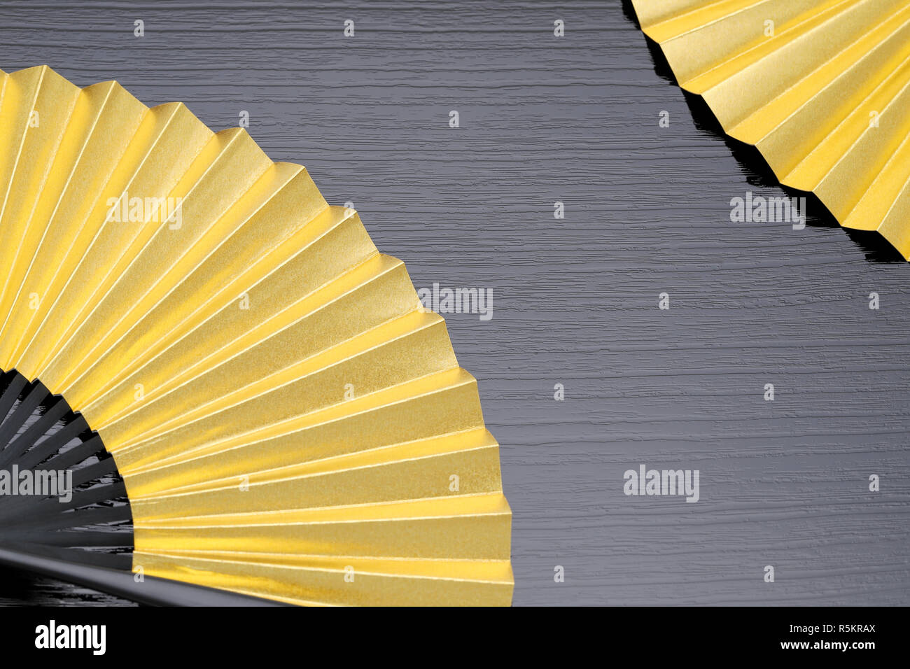 traditional chinese style golden hand fan on gray backgroundã€€ Stock ...