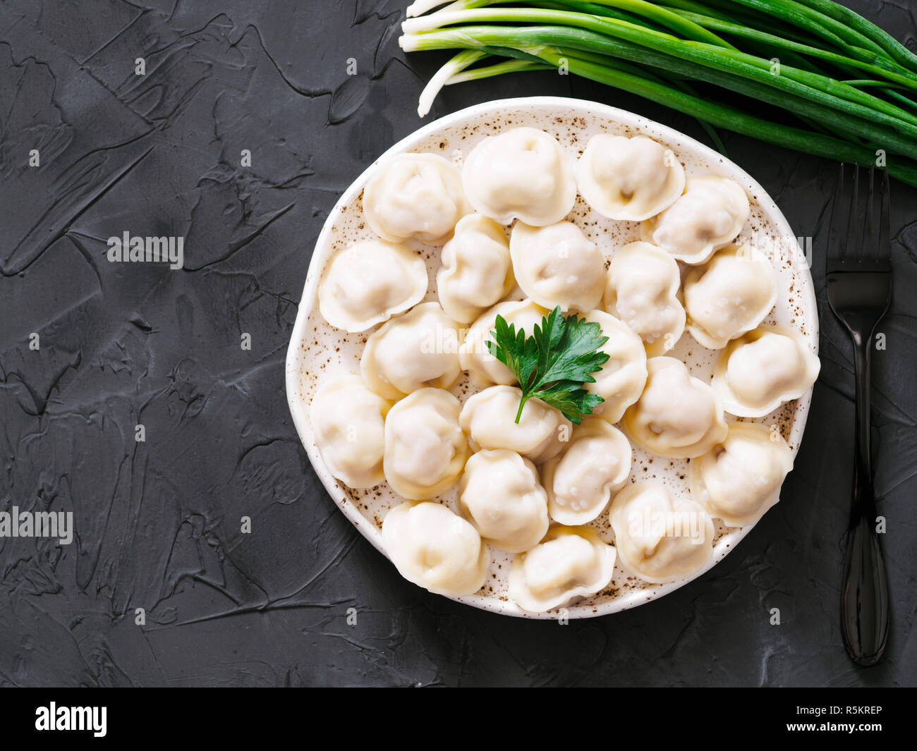 Russian pelmeni, ravioli, dumplings with meat Stock Photo - Alamy