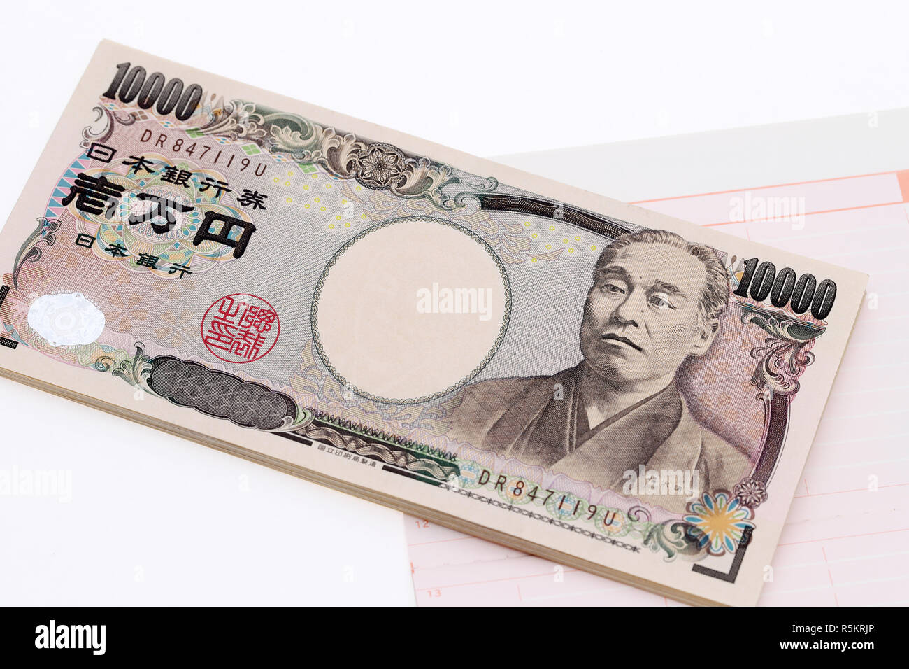 Japanese money and bankbook isolated on white backgroundã€€ Stock Photo ...