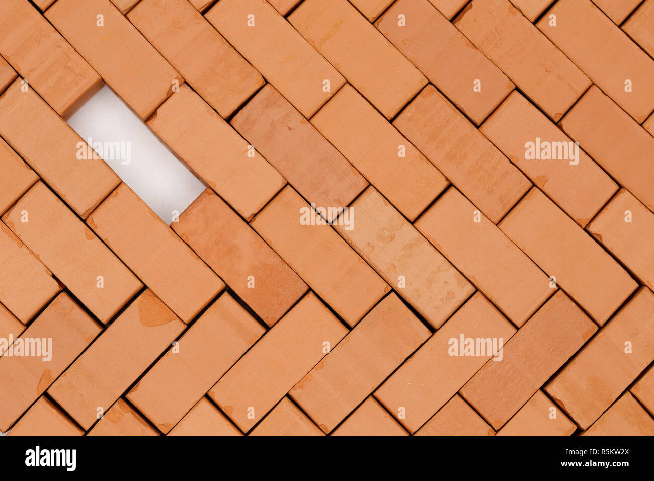 brick pattern with missing stone Stock Photo - Alamy