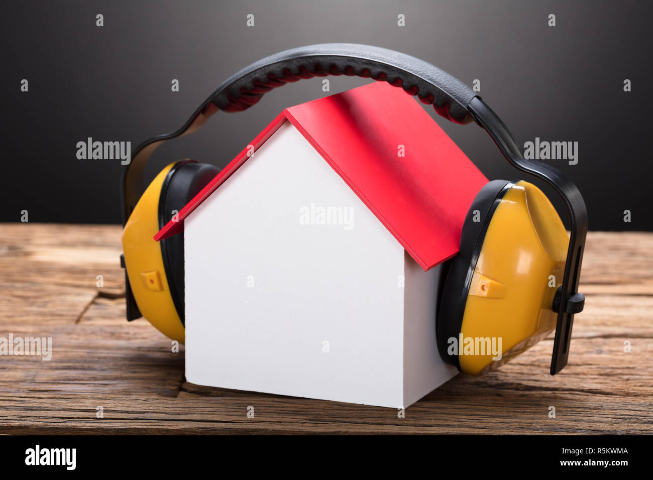 Model Home With Ear Protectors On Table Stock Photo - Alamy