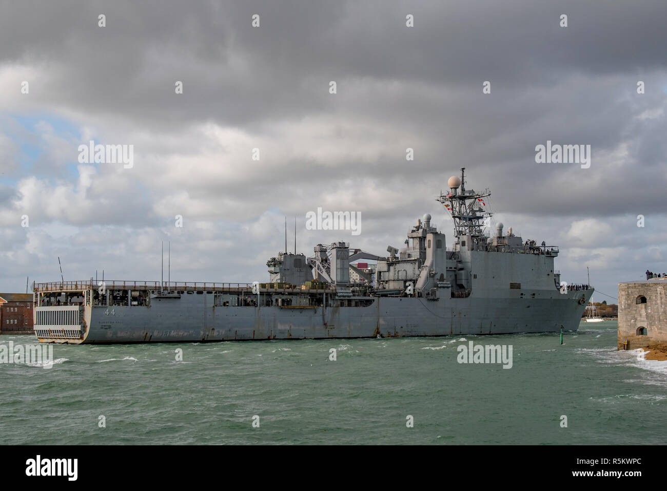The United States Navy dock landing ship, USS Gunston Hall passing the ...
