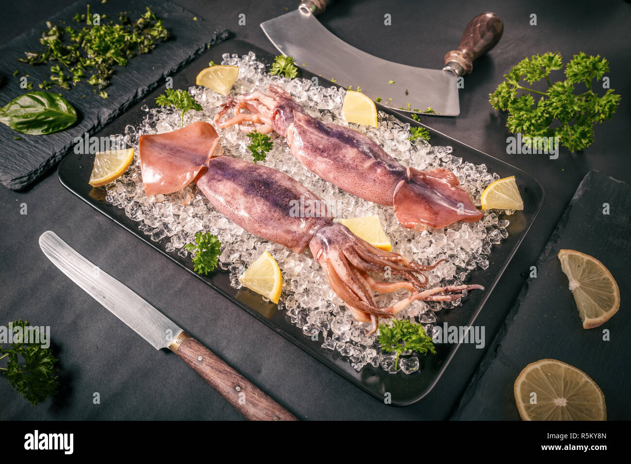 Fresh raw squid Stock Photo - Alamy
