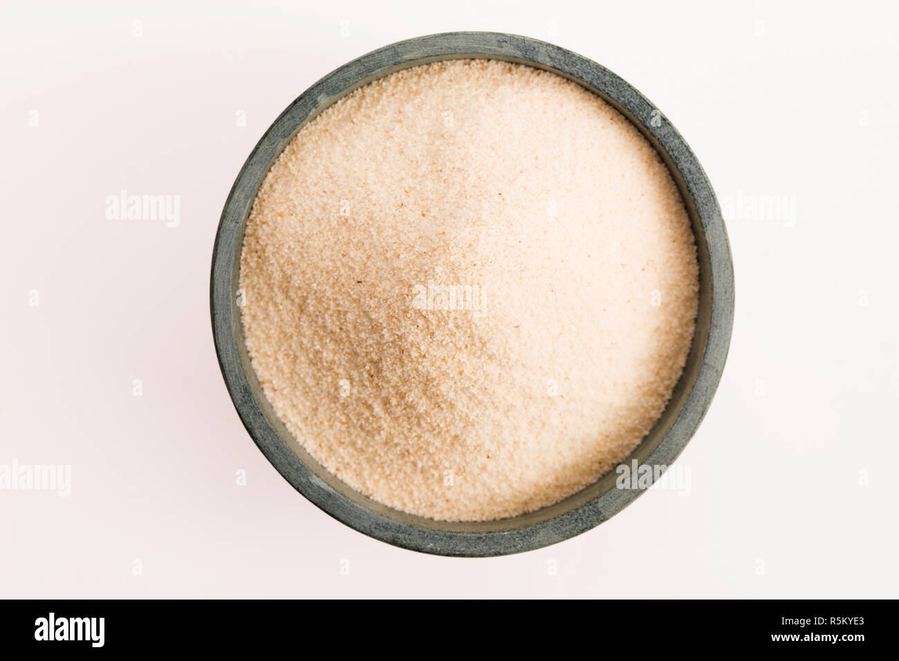 bowl of semolina isolated on white Stock Photo - Alamy