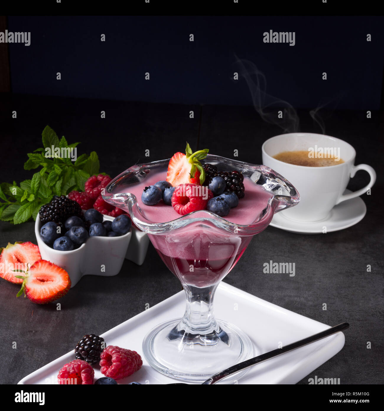 delicious pudding with wild berry Stock Photo - Alamy