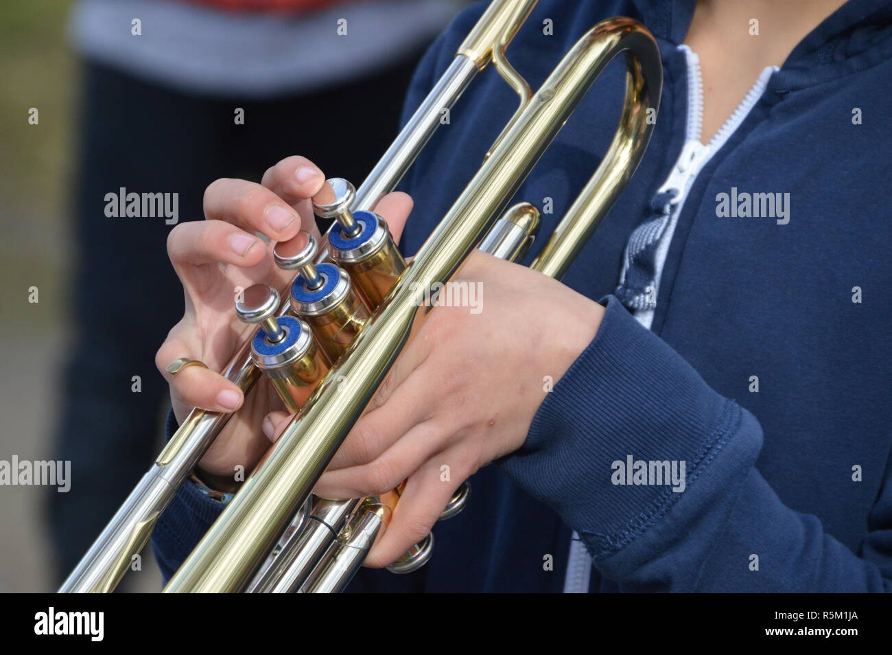 Boy Playing Trumpet Stock Photo - Alamy