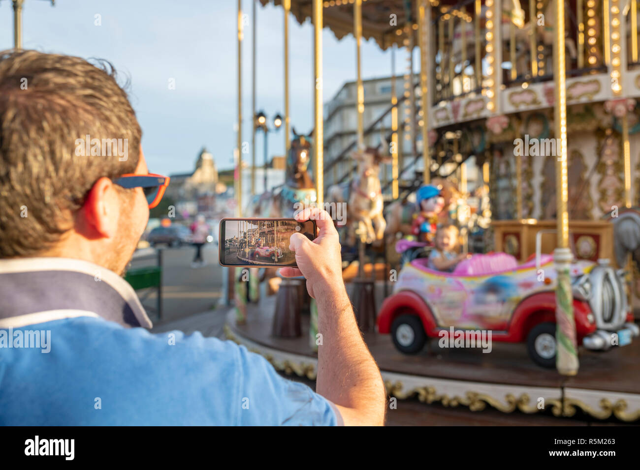 Father daughter child carousel hi-res stock photography and images - Alamy