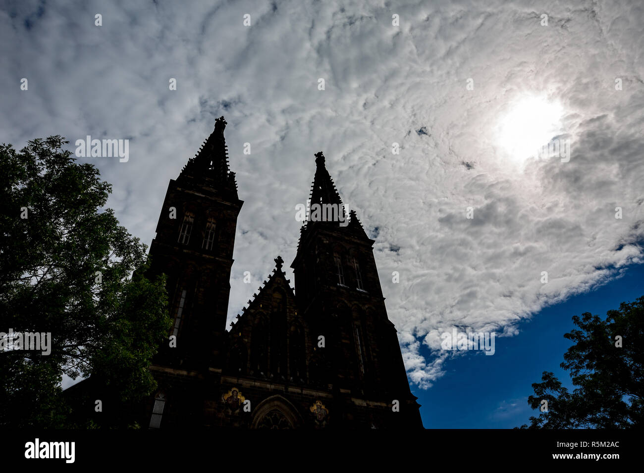 Weird and impressive summer sky with layered puffy clouds and cathedral ...