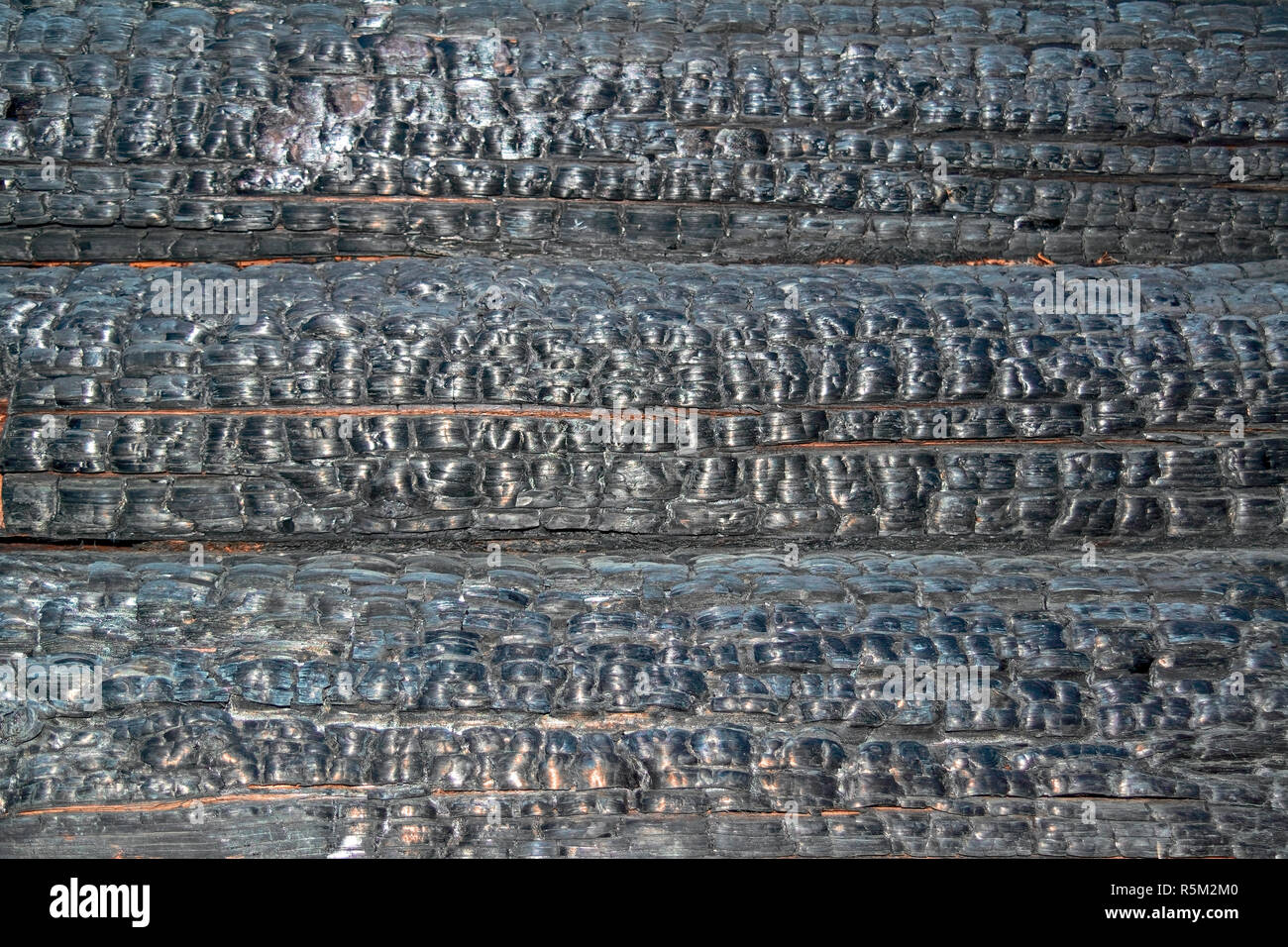 Texture of charred logs. Burned wooden charred log house texture ...