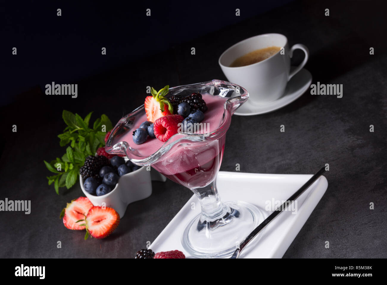 delicious pudding with wild berry Stock Photo - Alamy