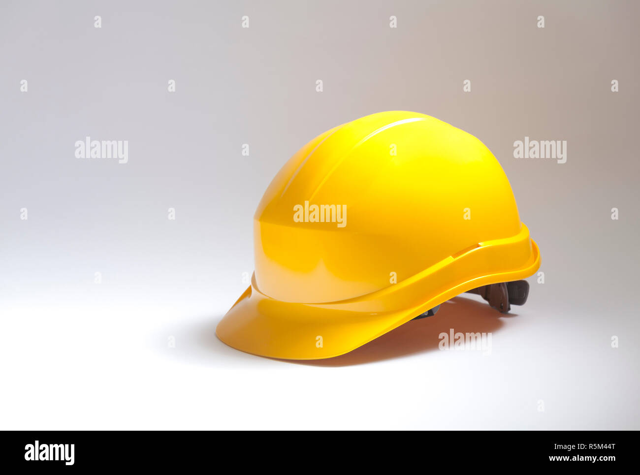 Yellow safety helmet Stock Photo - Alamy