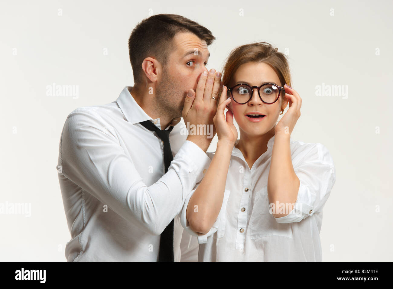 Office workers gossiping hi-res stock photography and images - Alamy