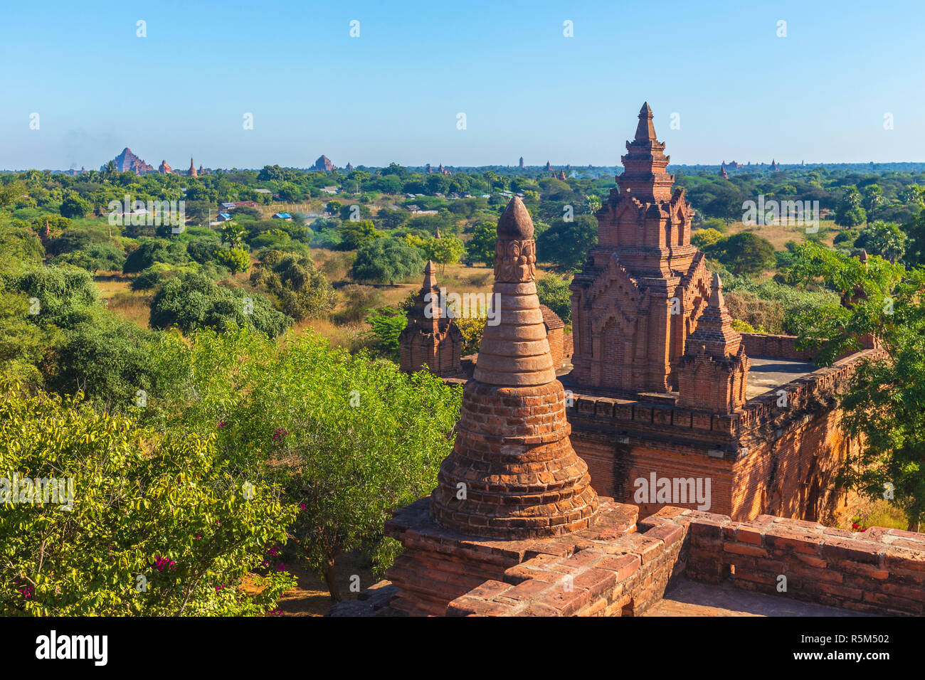 Bagan buddha tower at day Stock Photo - Alamy