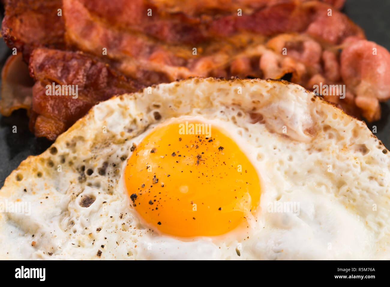 Fried Egg And Bacon Rashers Stock Photo - Alamy