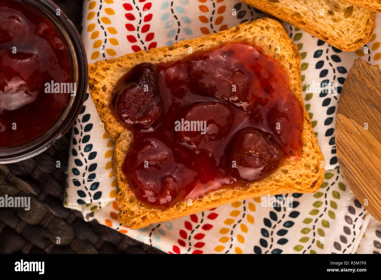 Breakfast of cherry jam on toast Stock Photo - Alamy