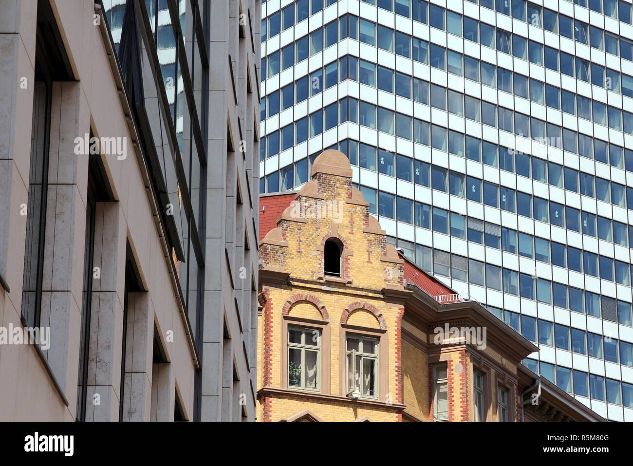 contrast between old building and new building Stock Photo - Alamy