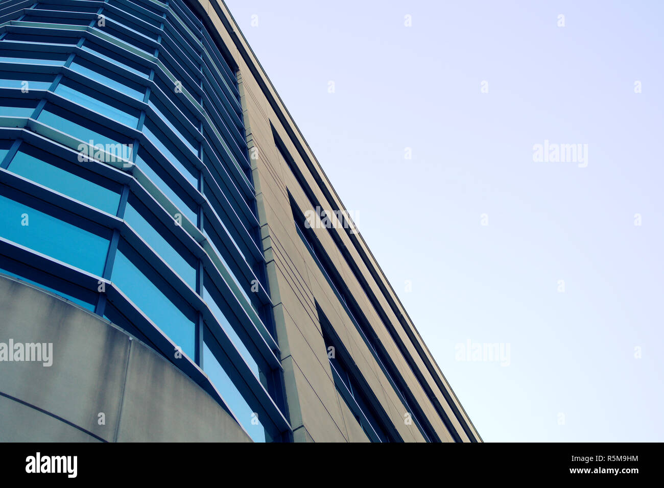 office building round corner skyscraper metal structure windows and ...