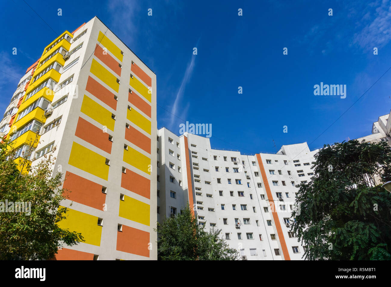 Apartment building brightly painted in Bucharest, Romania Stock Photo ...