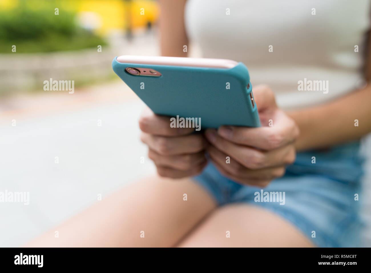 Using smart phone Stock Photo - Alamy