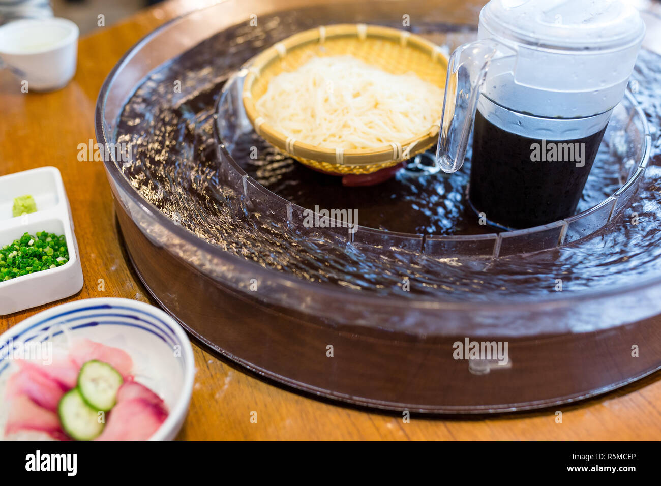 Water flow noodles in Japanese restaurant Stock Photo - Alamy
