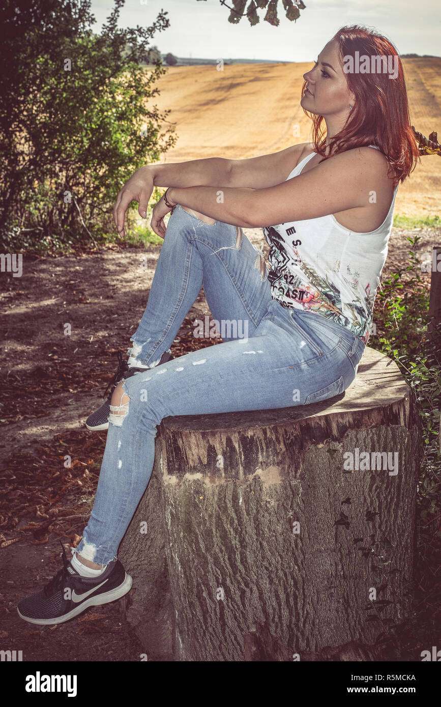 Chilling on a stump Stock Photo - Alamy