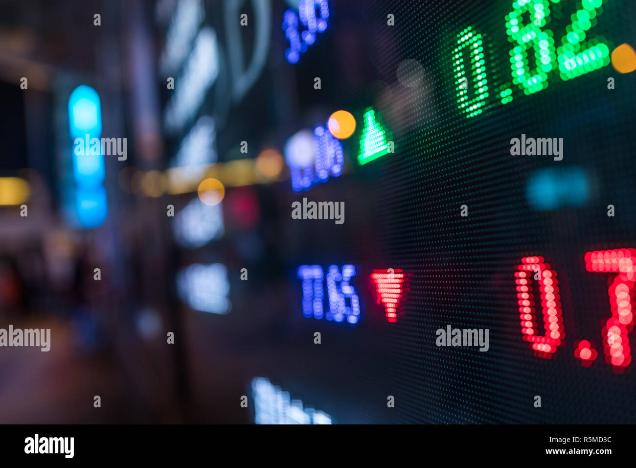 Stock market display in the city at night Stock Photo - Alamy
