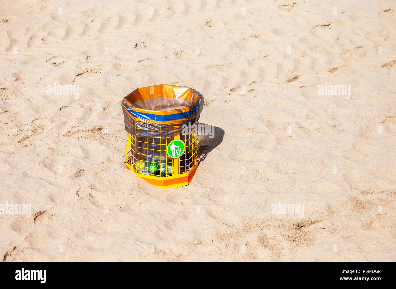 Garbage container for waste and trash at the sand beach Stock Photo - Alamy