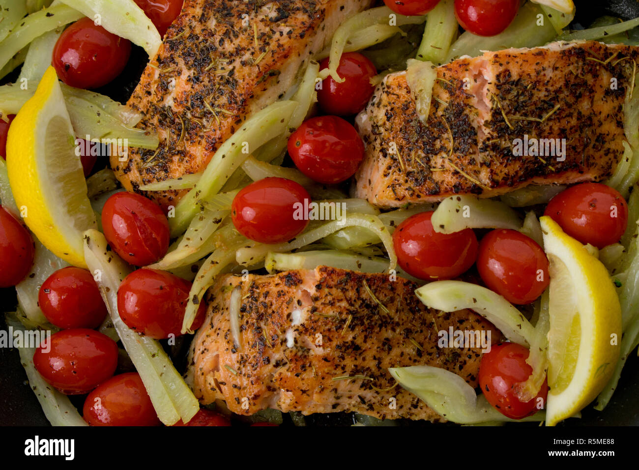 Slices fried fish tomatoes hi-res stock photography and images - Alamy